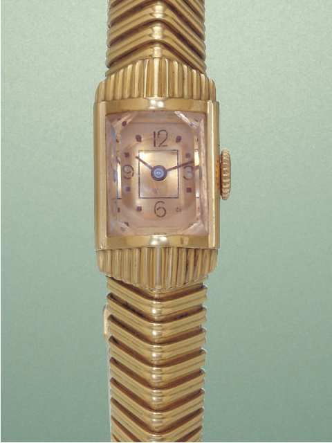 Starina Watch Co. Produced in the 1950's.Fine and unusual 18K yellow ...